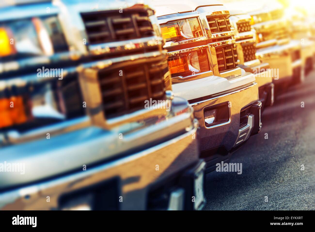 Car Sales Business Photo Concept. Row of Brand New Vehicles For Sale at ...