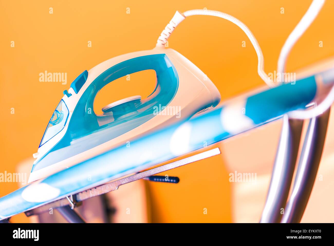 Clothes Ironing Closeup. Ironing Clothes On Ironing Board. Household ...