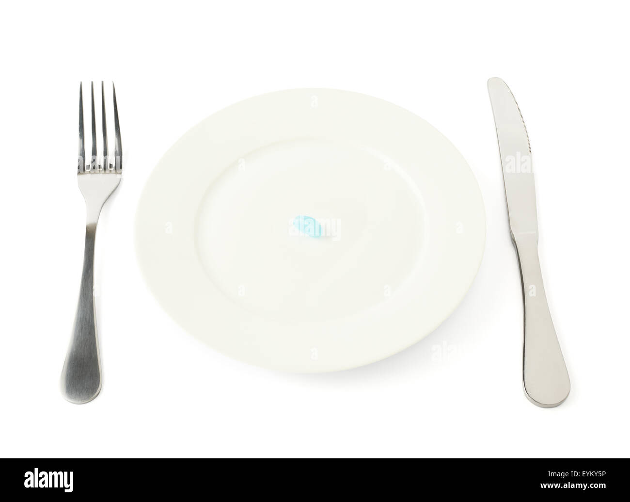 Single candy in a plate isolated Stock Photo - Alamy