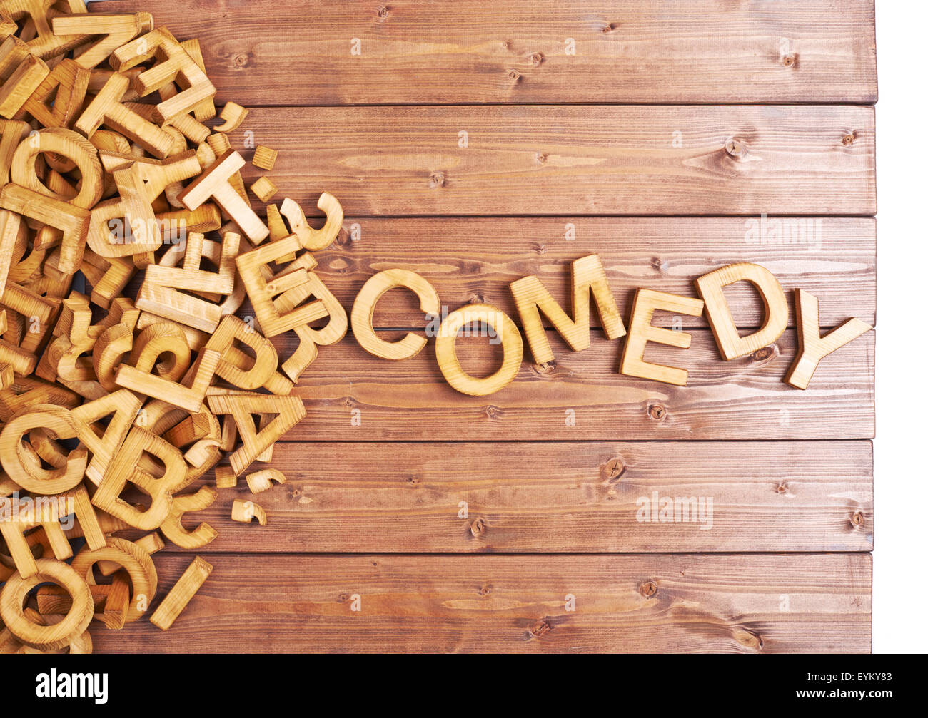 Word comedy made with wooden letters Stock Photo - Alamy
