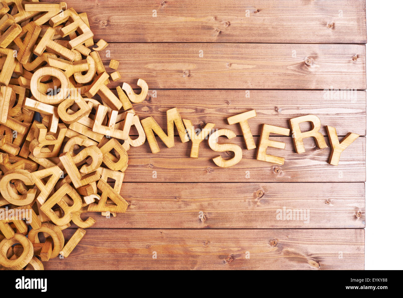 Word mystery made with wooden letters Stock Photo - Alamy
