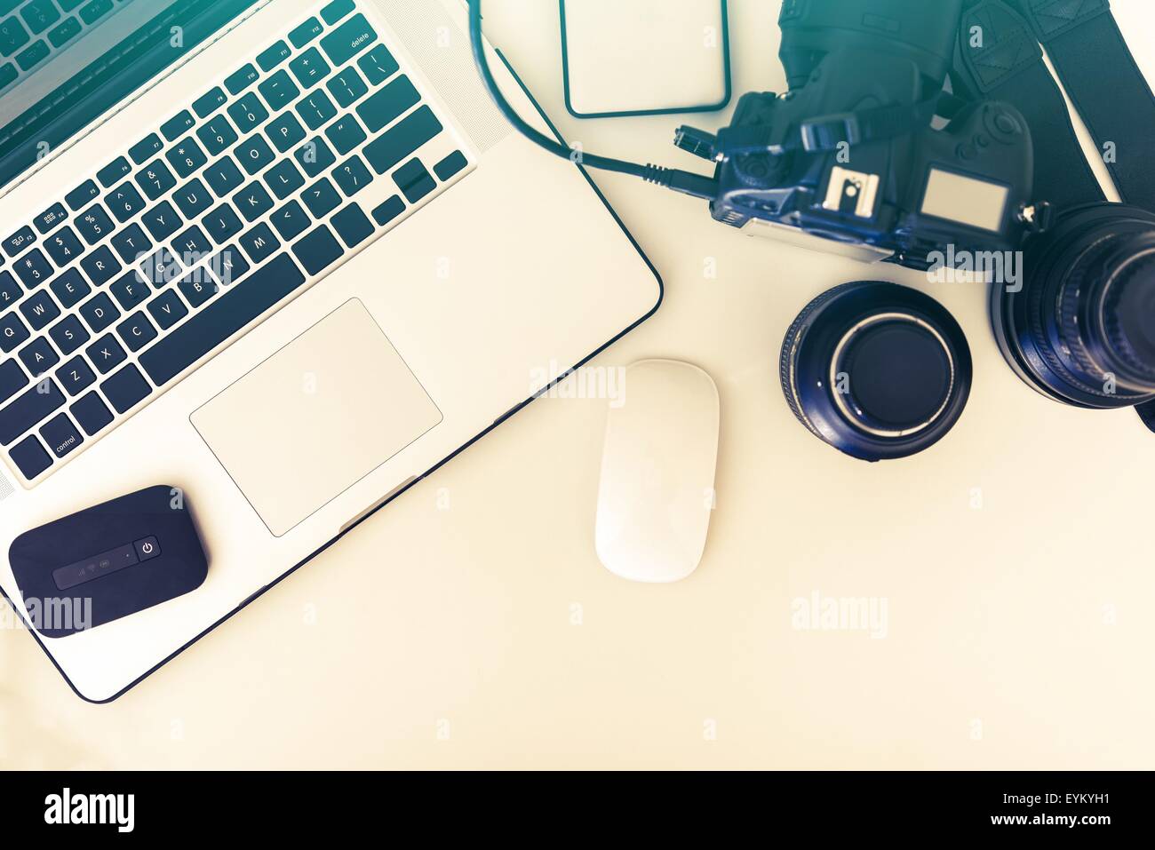 Photographer Desk. Downloading New Pictures From Modern Digital Camera ...