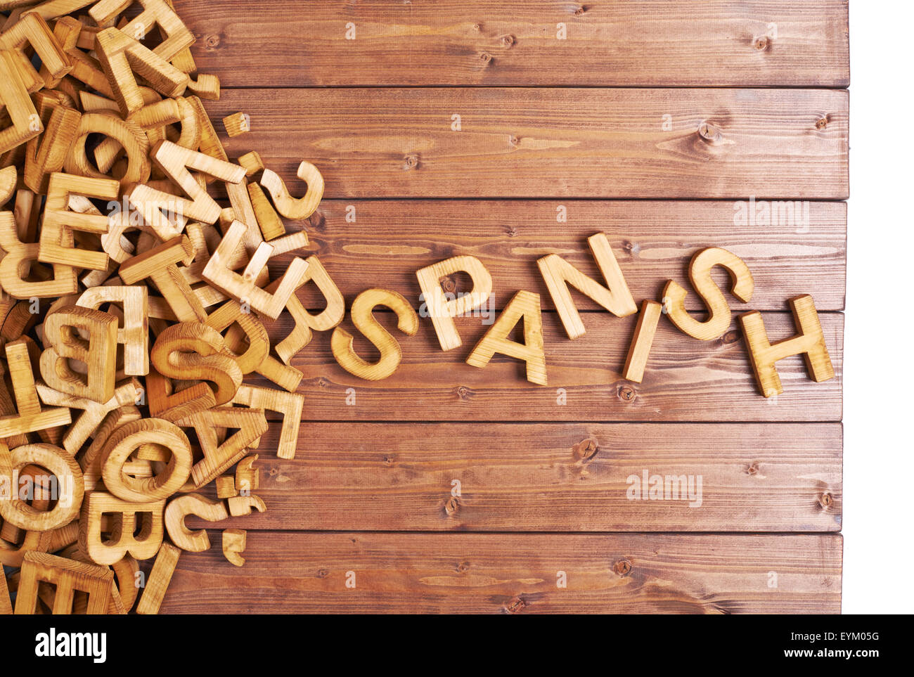 Word spanish made with wooden letters Stock Photo - Alamy