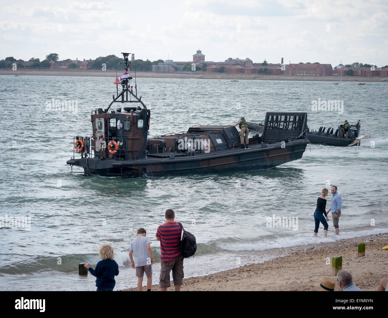 People watching a Royal Marines LCVP Mk5 landing craft on Southsea ...