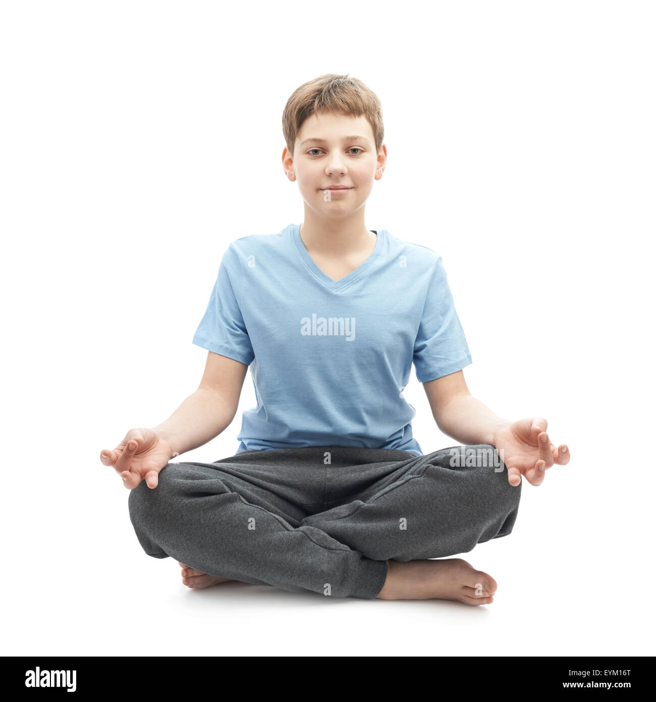 Boy doing yoga hi-res stock photography and images - Alamy