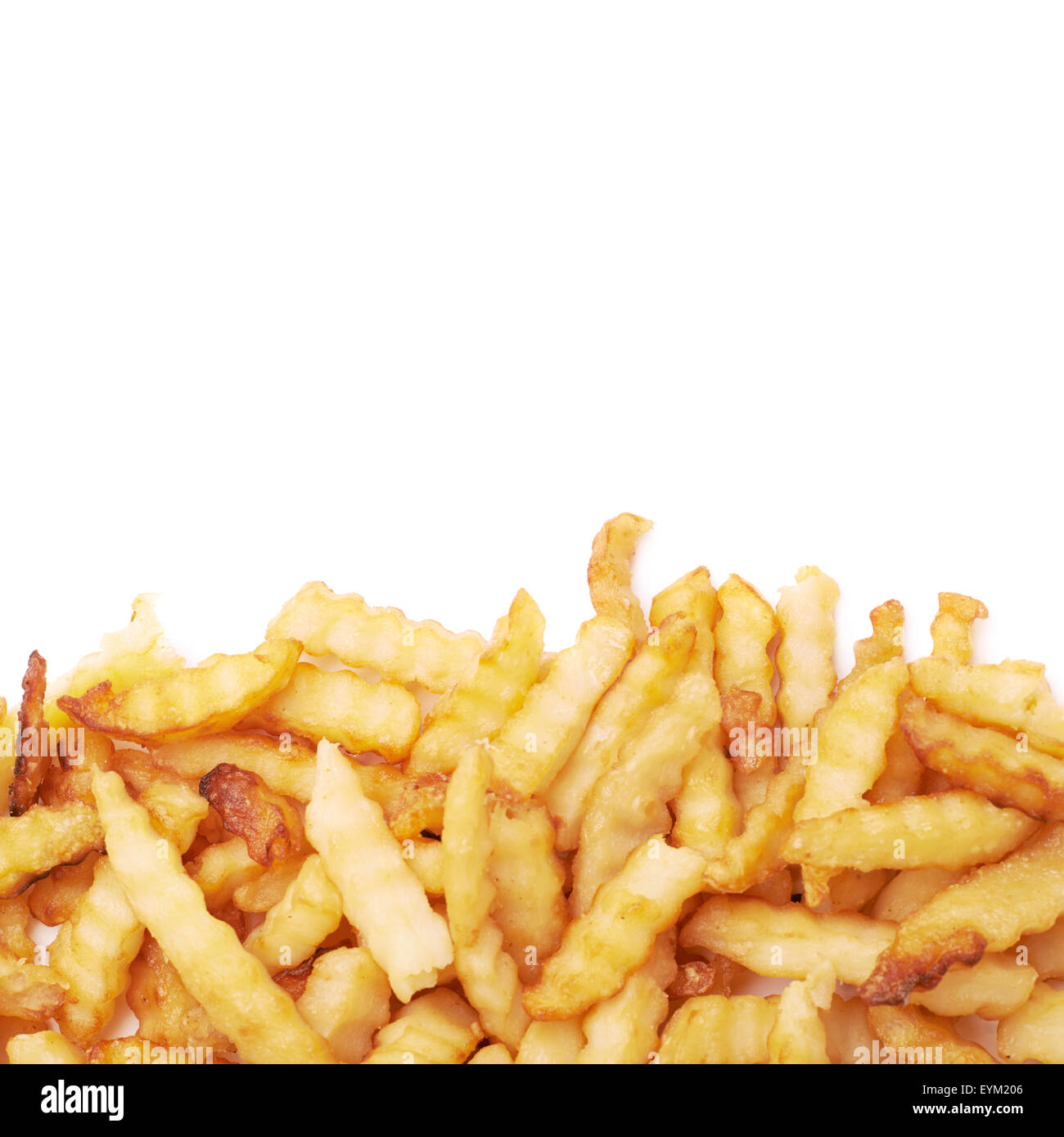 Pile of multiple wavy french fries isolated Stock Photo - Alamy
