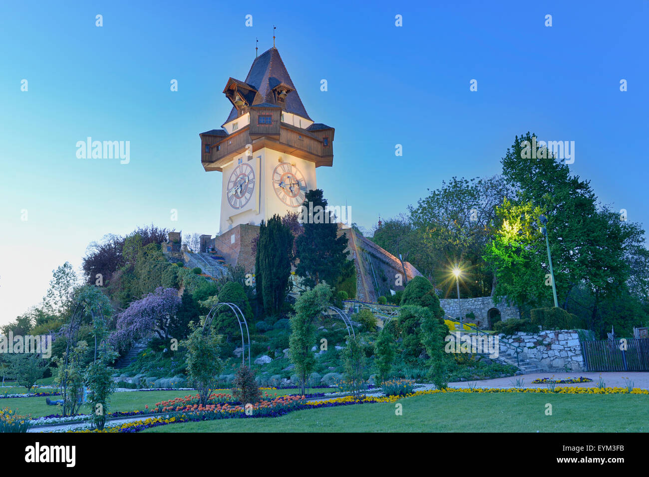 Scenery of the clock tower in Graz by the blue hour Stock Photo - Alamy