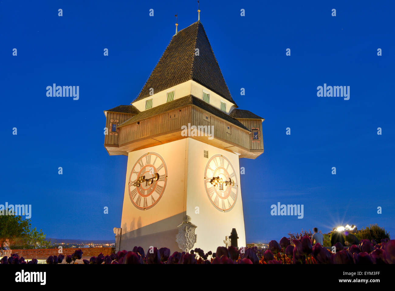 Scenery of the clock tower in Graz by the blue hour Stock Photo - Alamy