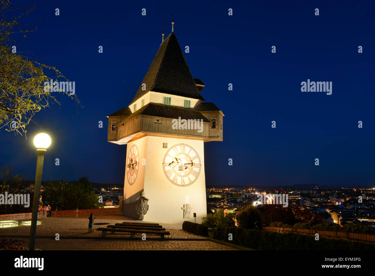 Scenery of the clock tower in Graz by the blue hour Stock Photo - Alamy