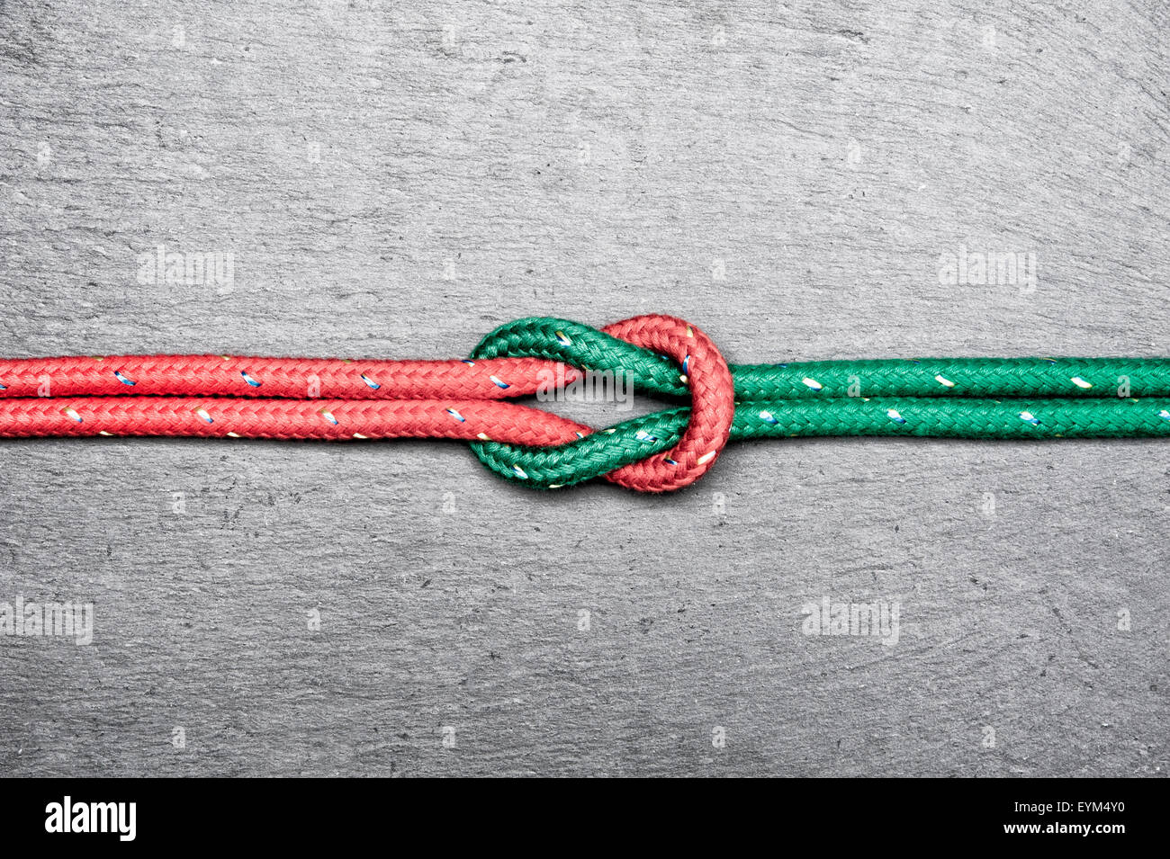 Ropes, rope, cross knot, red, green Stock Photo - Alamy