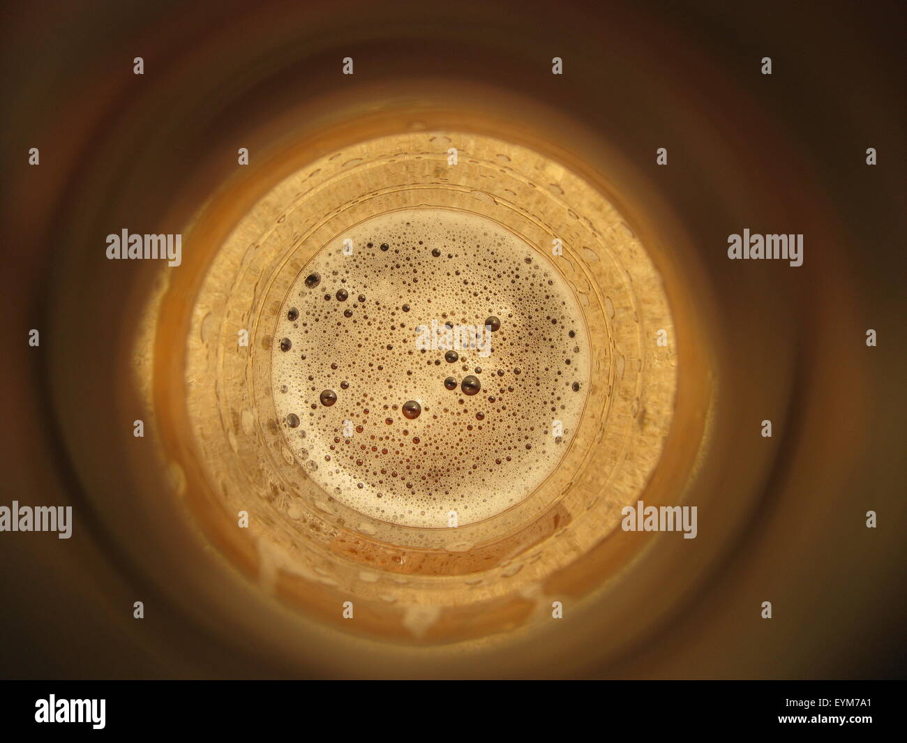 Bottom of a glass bottle on a white background Stock Photo - Alamy