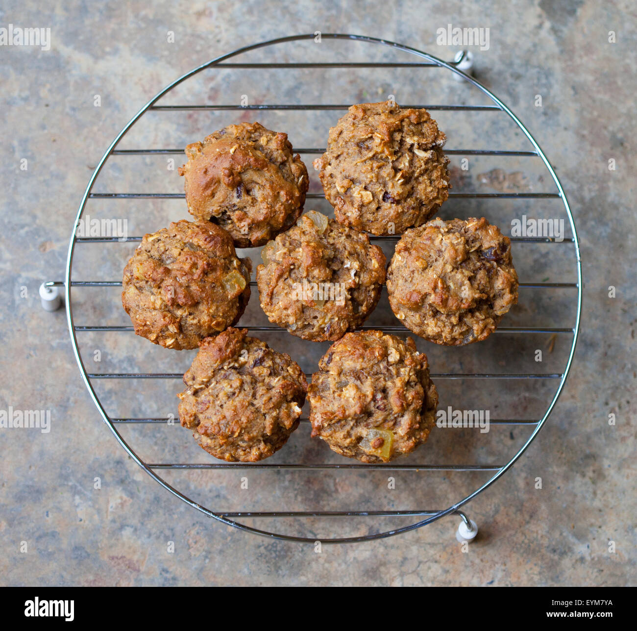 Freshly baked bran muffins cooling on a rack Stock Photo - Alamy