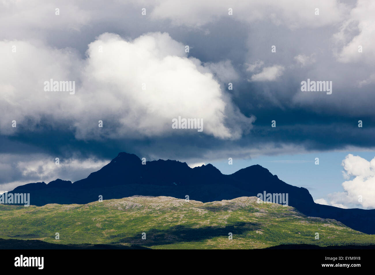 Clouds over mountains Stock Photo - Alamy
