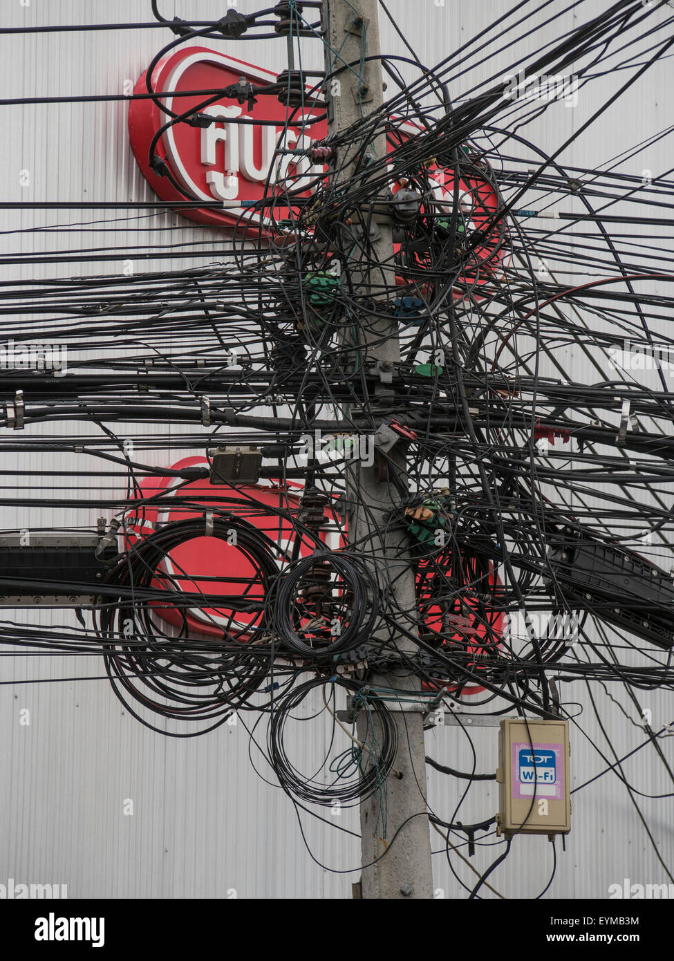 Overhead electric cables in Chiang Mai, Thailand Stock Photo - Alamy