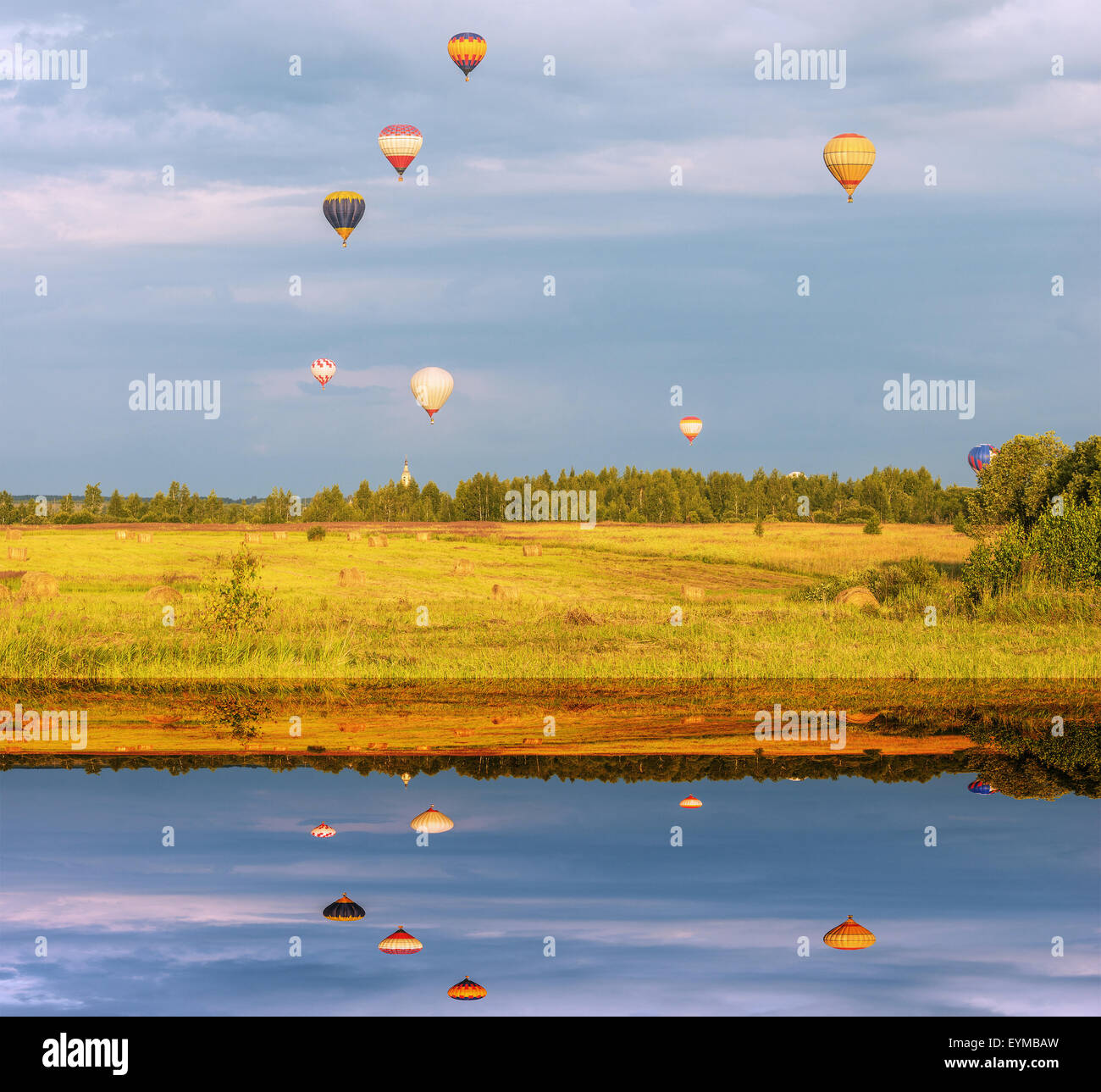 Evening flight of the hot air balloons above european countryside Stock ...