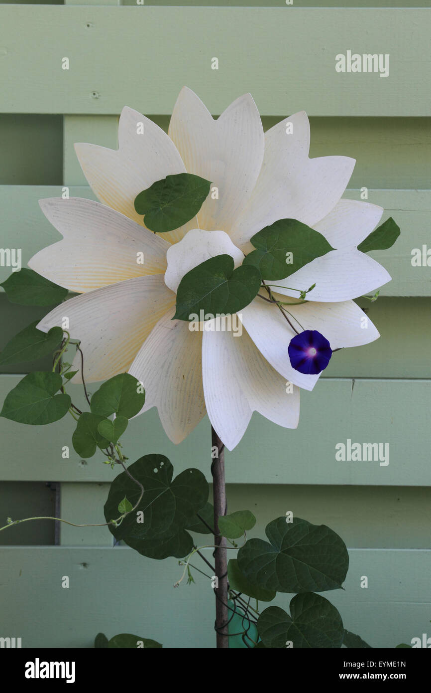 Wind turbine near fence hoist Stock Photo - Alamy