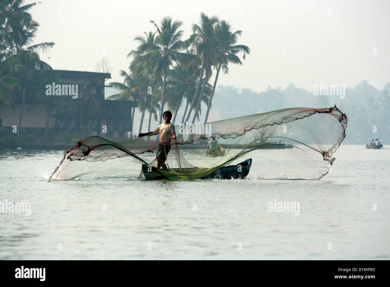 Fisherman Casting Net, Kerala, India Stock Photo - Alamy
