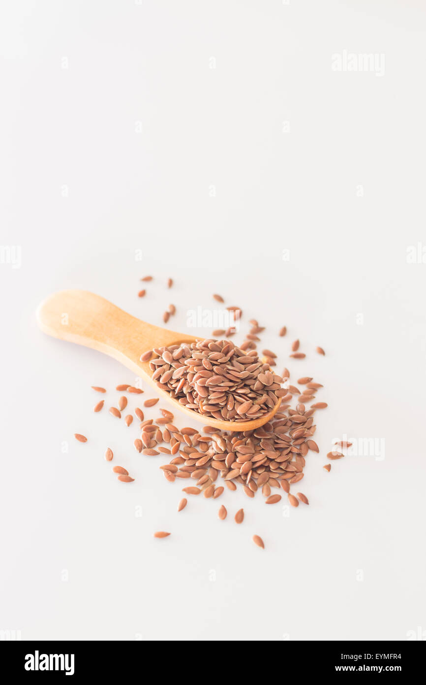 Brown flax seed on clean kitchen table Stock Photo - Alamy