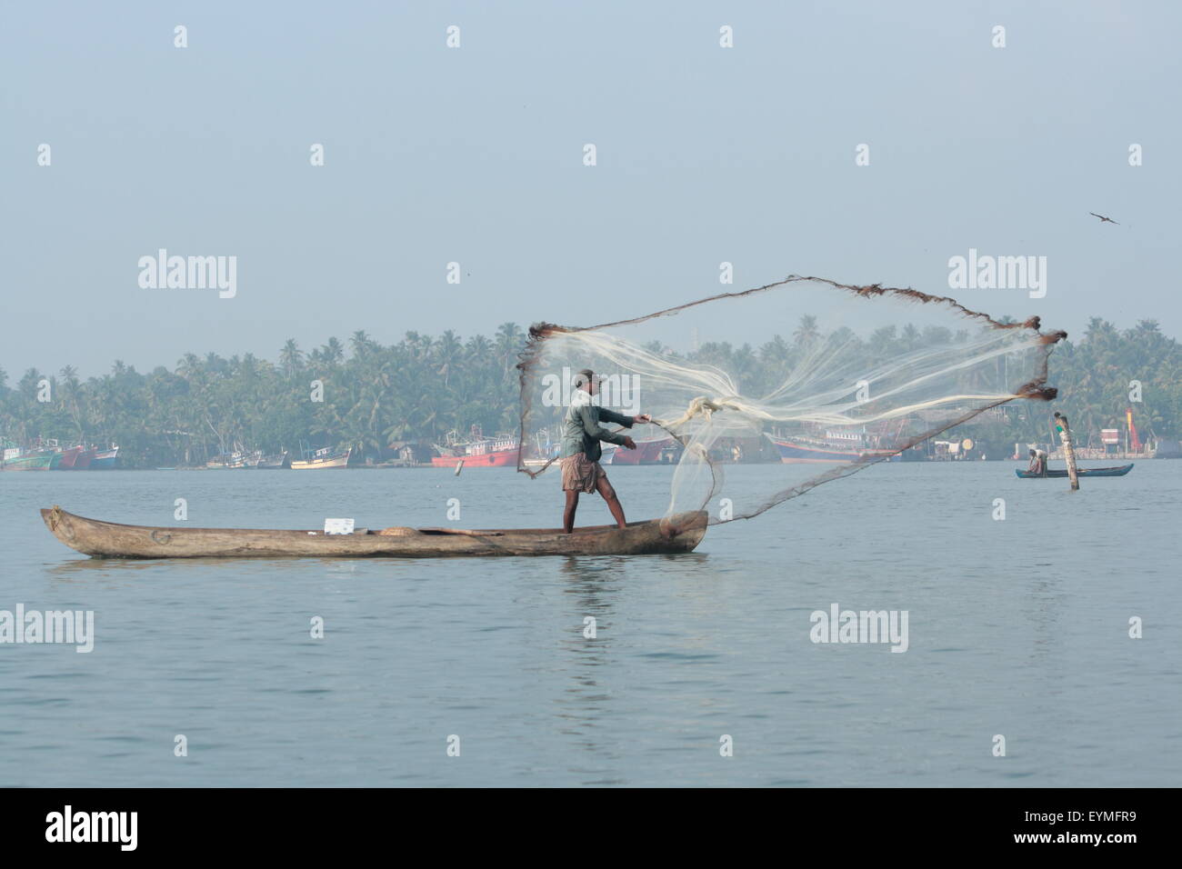 Fisherman Casting Net, Kerala, India Stock Photo - Alamy
