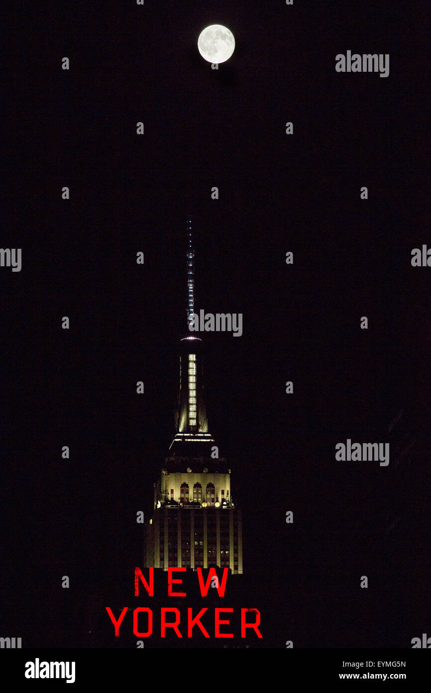 New York, USA. 31st July, 2015. A blue moon is seen over New York, the ...