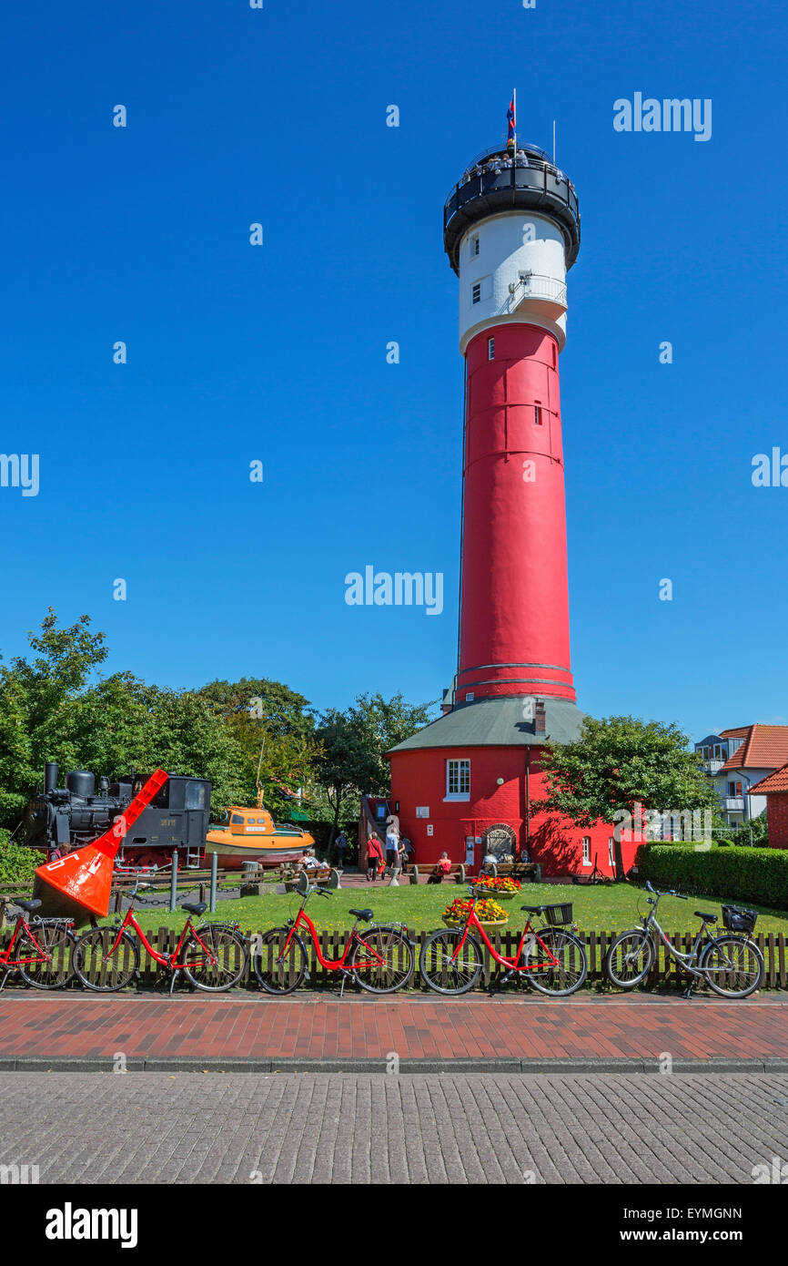 Buoy, steam engine, lifeboat, old lighthouse on the island Wangerooge ...