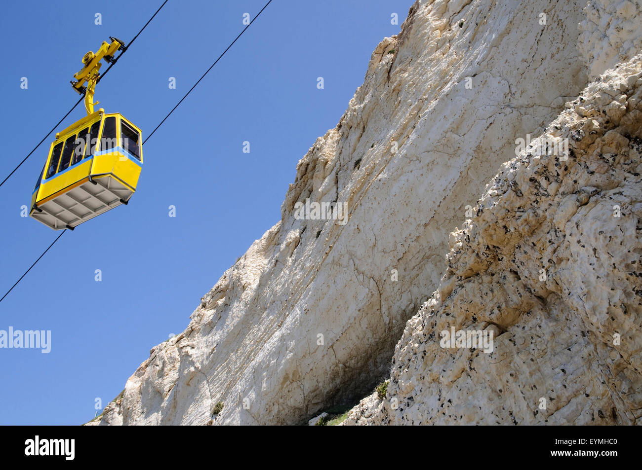 white rocky coast of Rosh Hanikra, white chalk cliffs, cable car ...