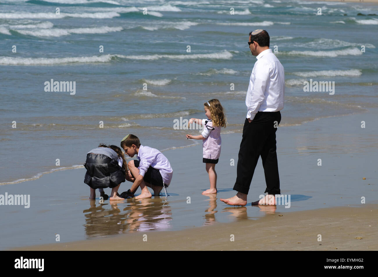 Jewish family on the beach, Netanya, Israel Stock Photo - Alamy