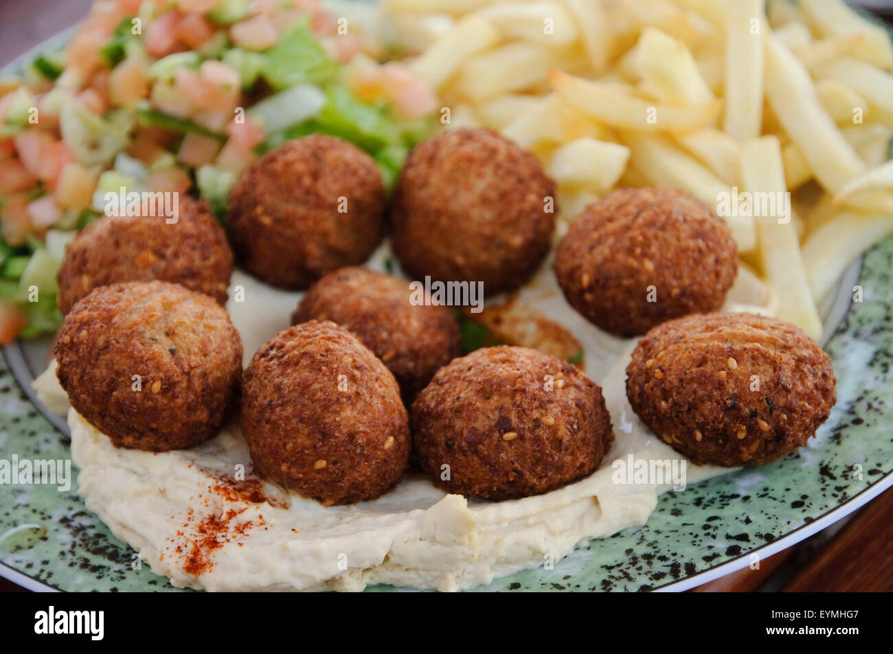 Falafel with chips and salad, Food, Israel Stock Photo - Alamy