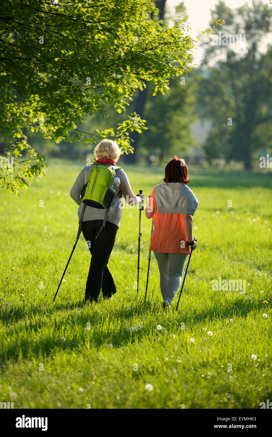 Female person backpack walking hi-res stock photography and images - Alamy