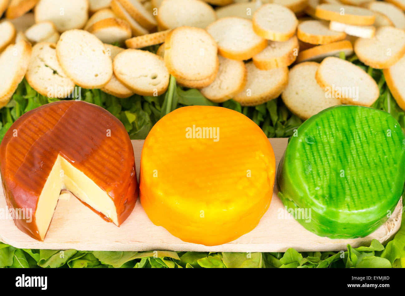Very nice delicate presentation of three different flavored cheeses ...