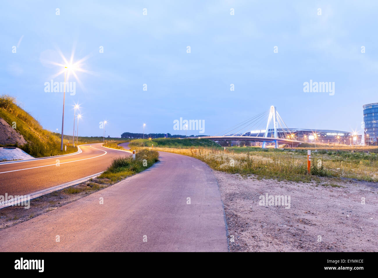 Under the bridge whit big road for bicycles Stock Photo - Alamy