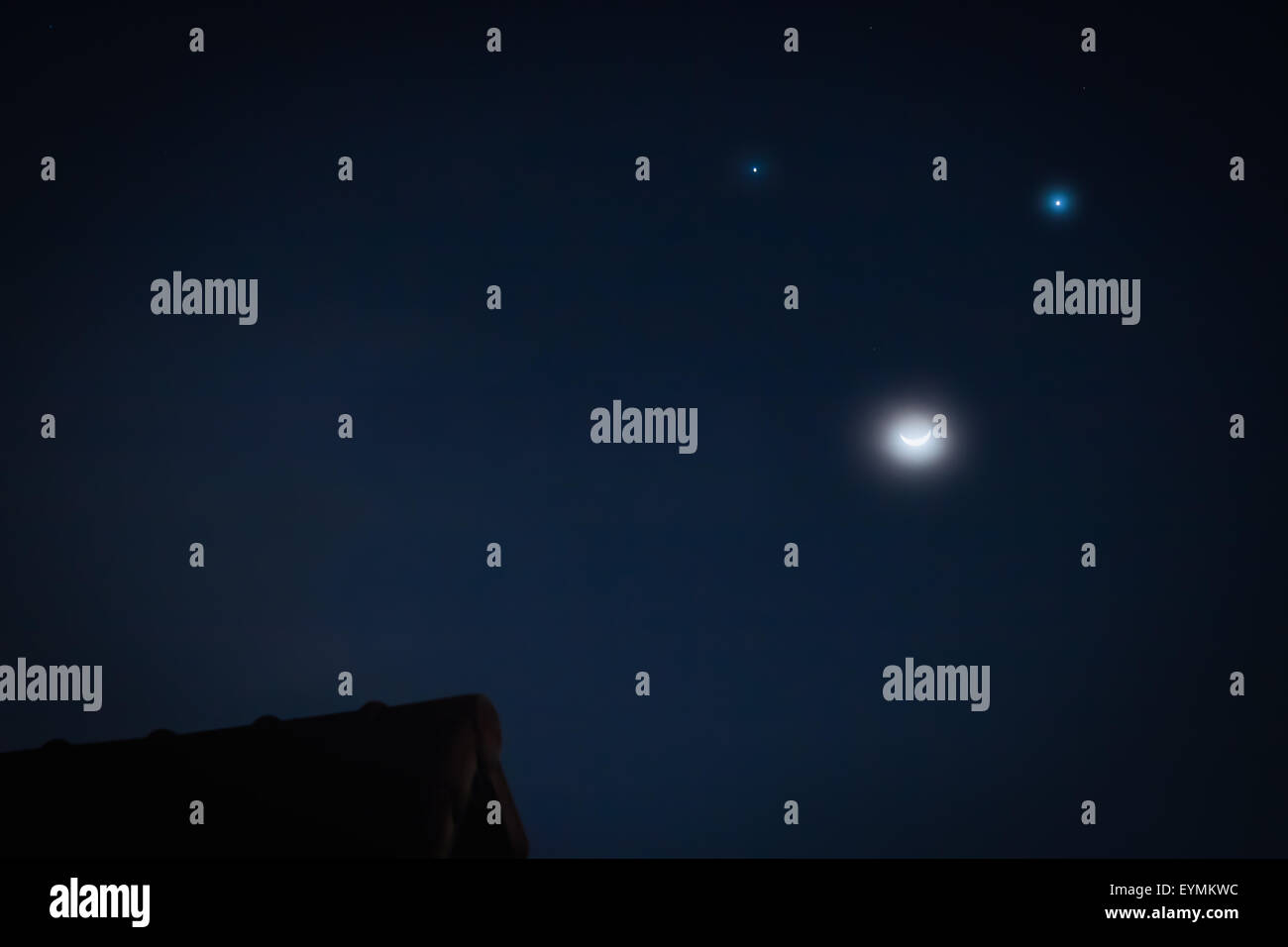 Celestial triangle moon venus jupiter hi-res stock photography and ...