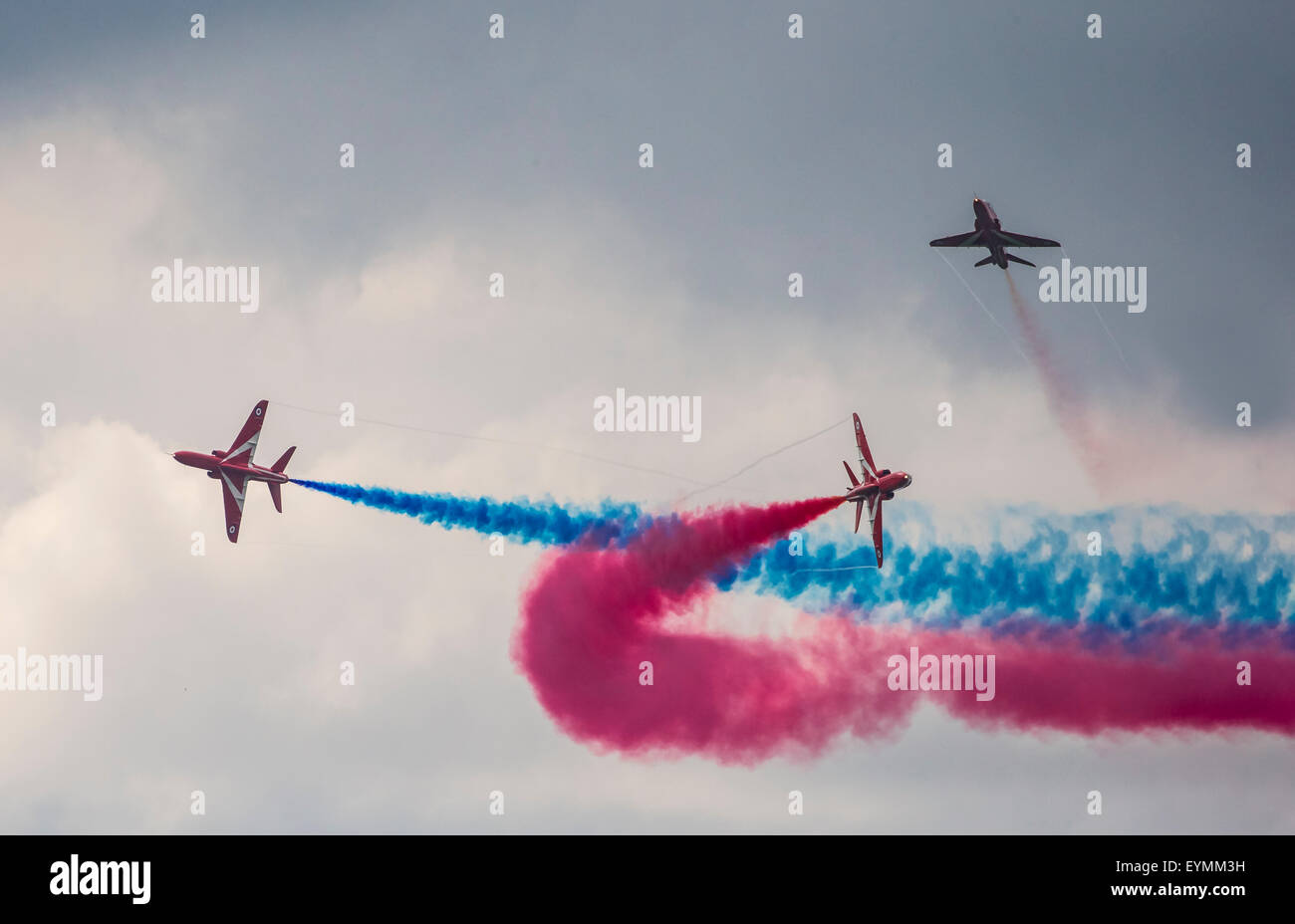 The Red Arrows RAF display team during a formation pass showing smoke ...