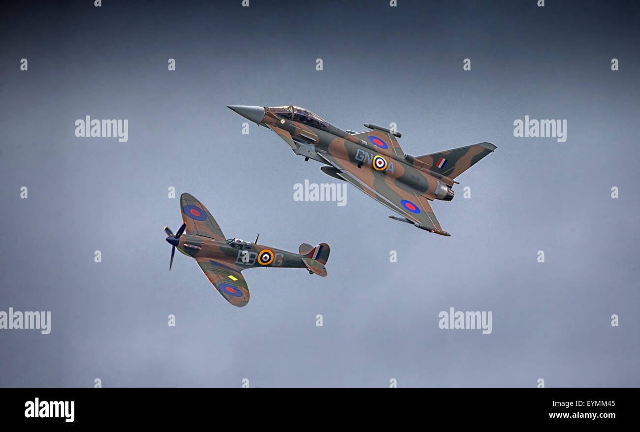 A RAF Typhoon Eurofighter GGR.4 with a Spitfire mkIIa forming the ...