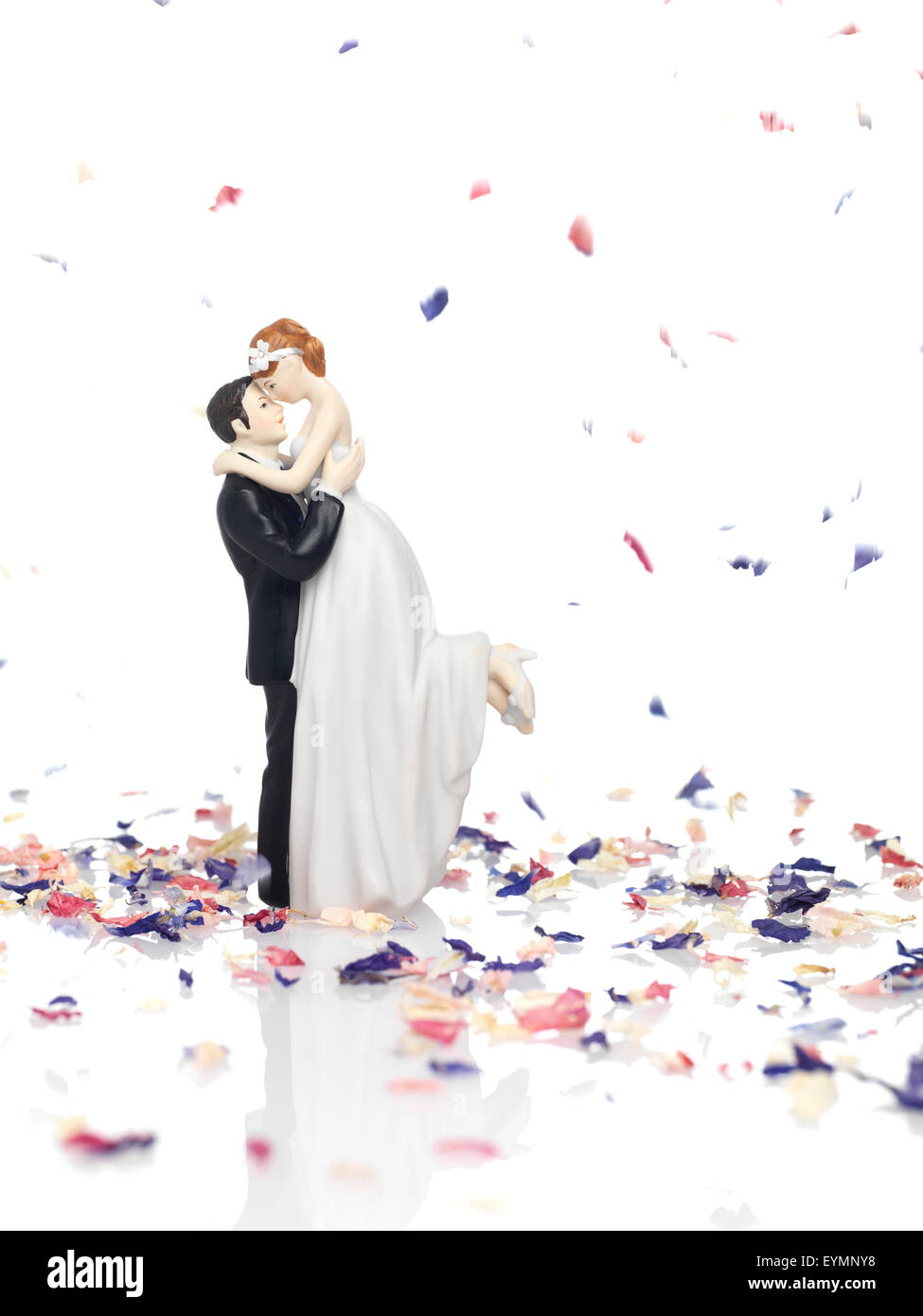 Bride and Groom with confetti Stock Photo - Alamy