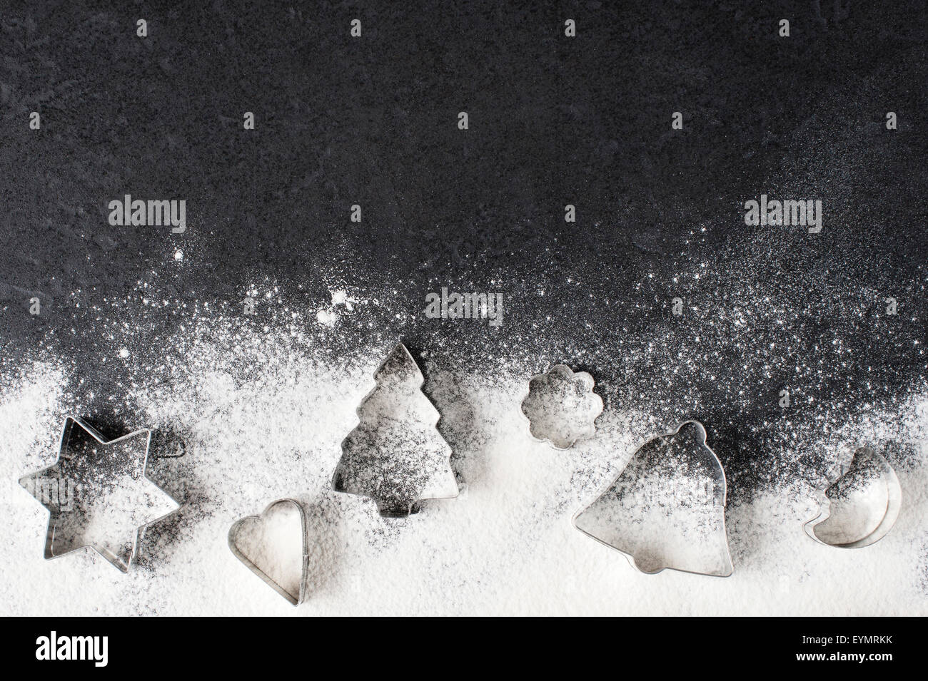 Baking molds and flour on the table Stock Photo - Alamy