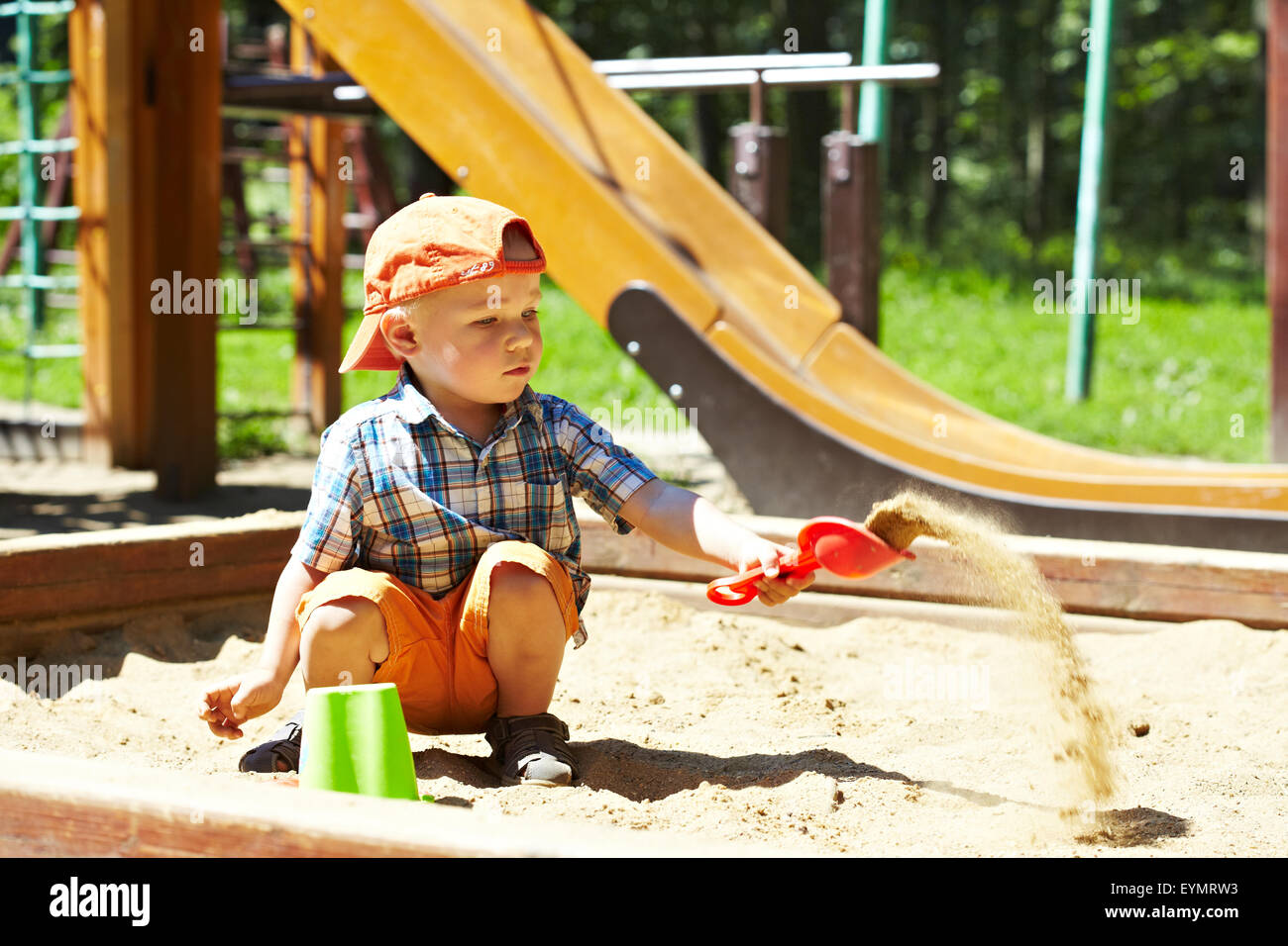 Child on playground Stock Photo - Alamy