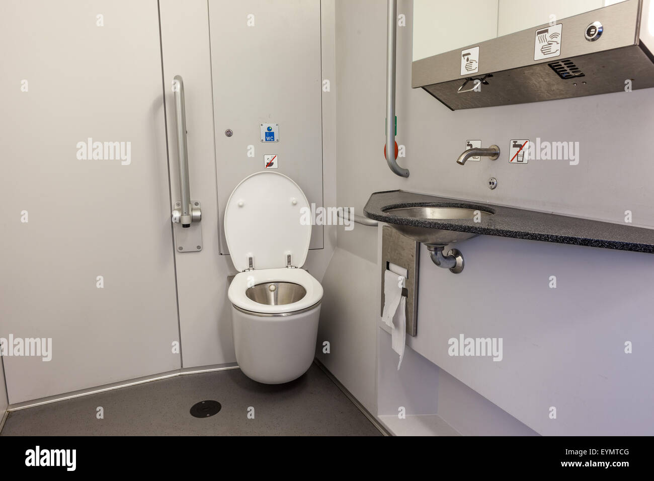 Restroom in an public Train whit white door Stock Photo - Alamy