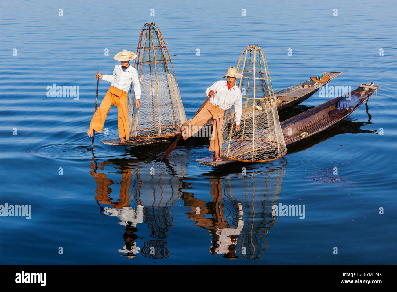 Myanmar travel attraction landmark - Traditional Burmese fishermen with ...