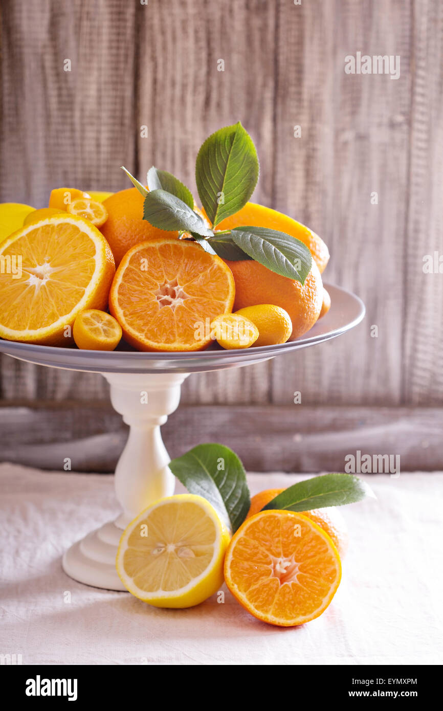 Variety of citrus fruits on a stand Stock Photo - Alamy