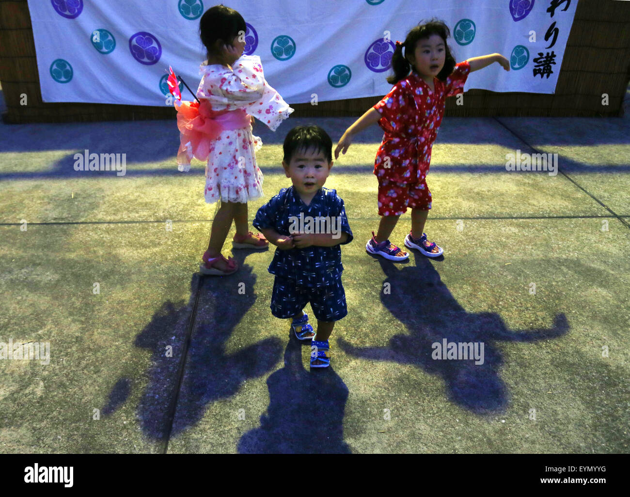 Tokyo, Japan. 1st Aug, 2015. Children perform bon dance during the ...
