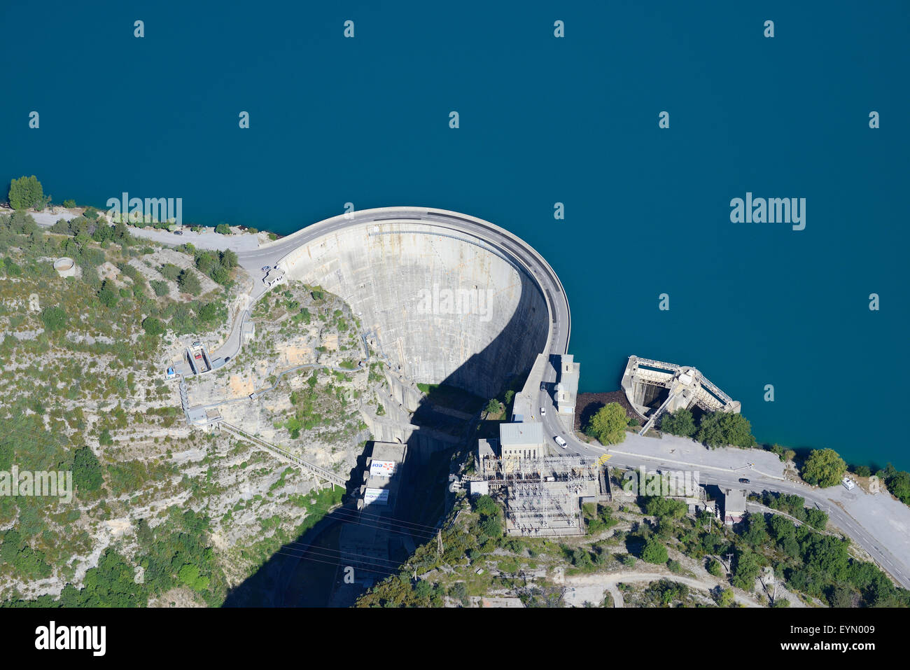 AERIAL VIEW. Castillon Dam (height: 101 meters) and Lake Castillon, a ...