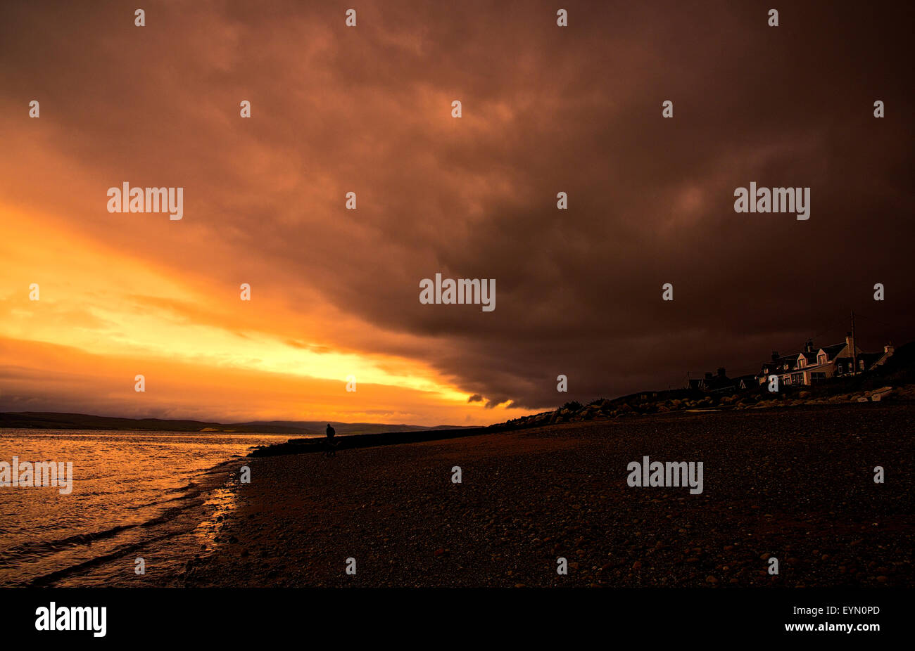 Evening Stroll Along The Shore At Pirnmill, Isle of Arran Stock Photo ...