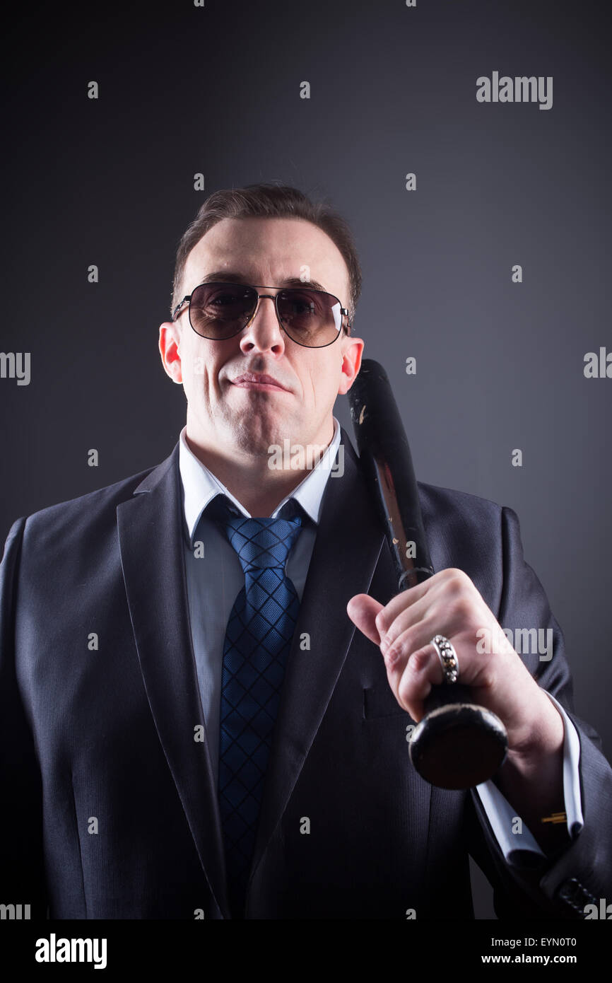 male gangster with baseball bat Stock Photo - Alamy