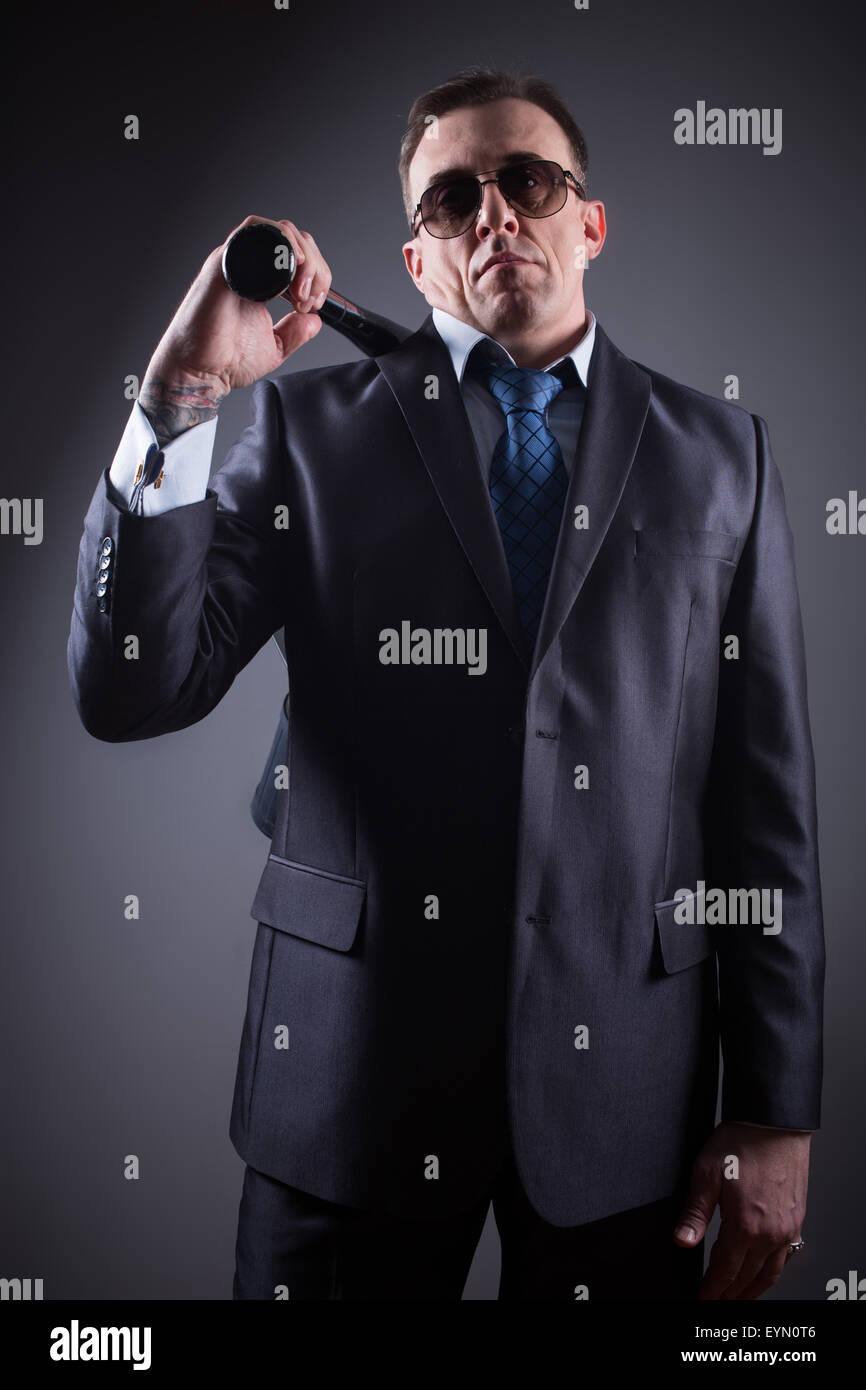 male gangster with baseball bat Stock Photo - Alamy