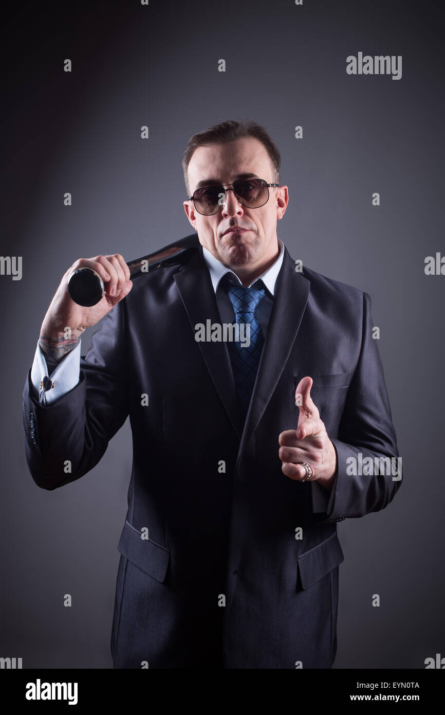male gangster with baseball bat Stock Photo - Alamy