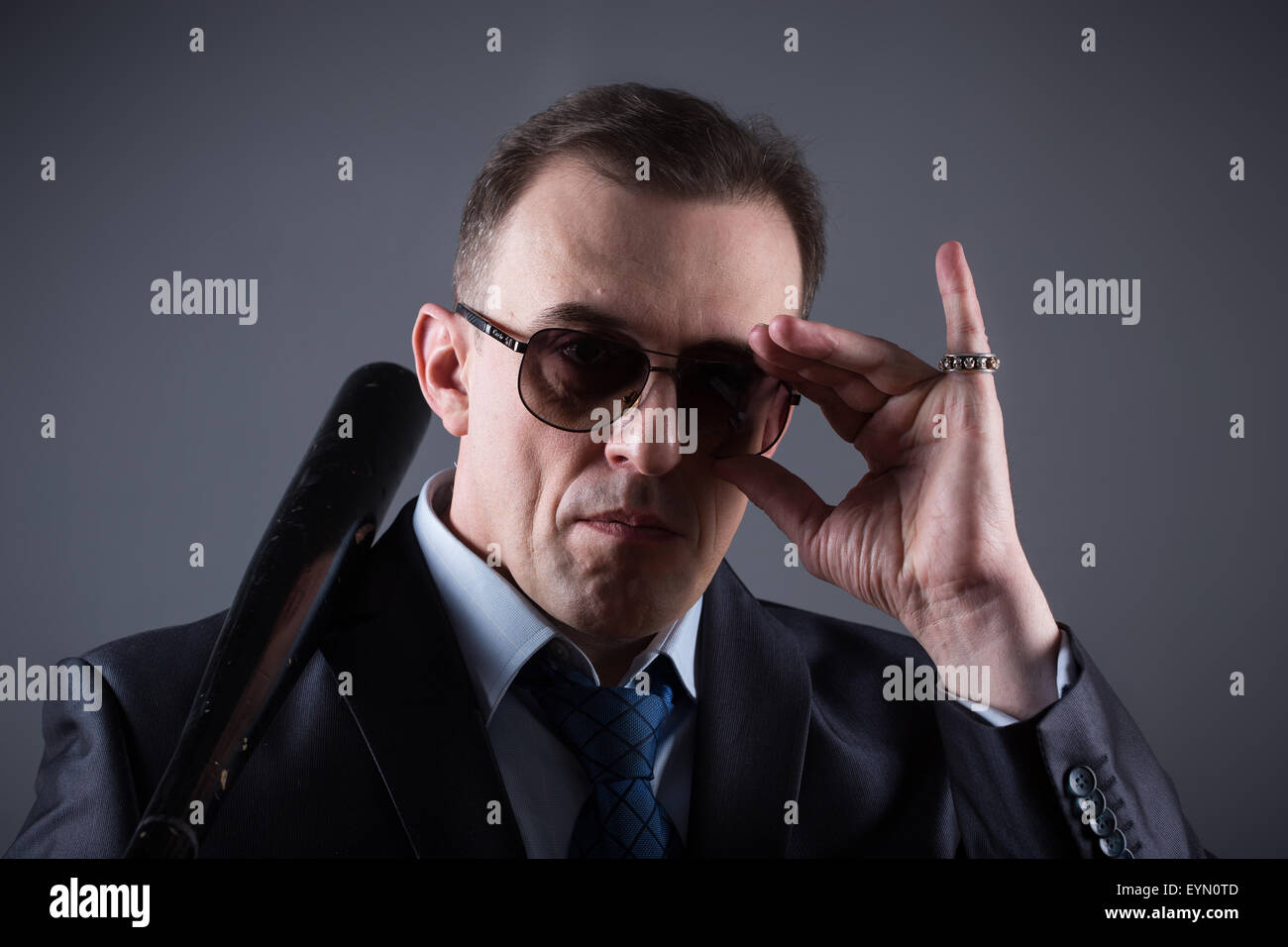 male gangster with baseball bat Stock Photo - Alamy