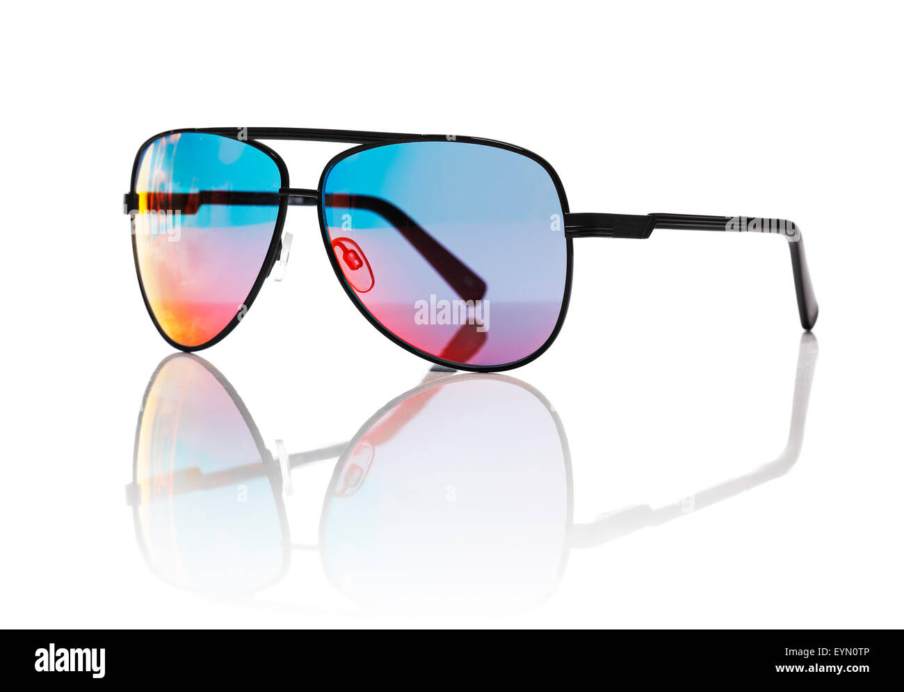 Sunglasses on a white reflective background Stock Photo - Alamy