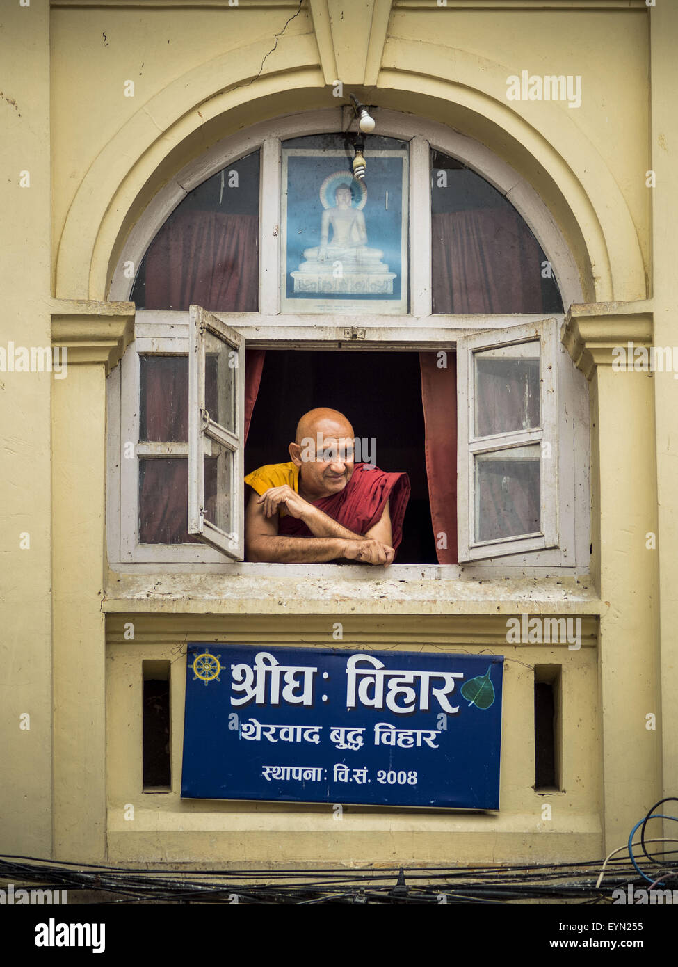 Aug. 1, 2015 - Kathmandu, Nepal - A Buddhist monk looks out the window ...