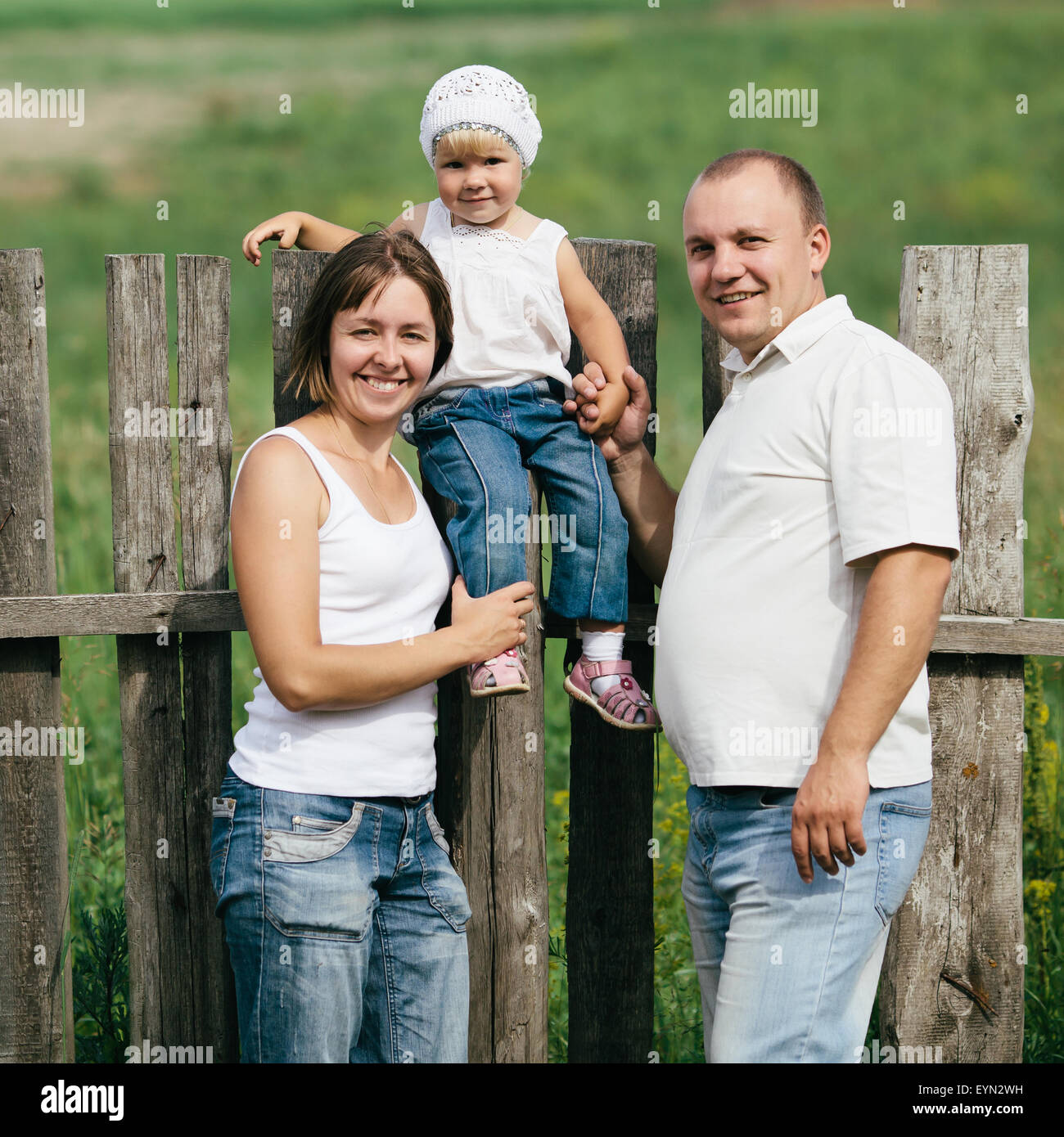 happy mother and father with child Stock Photo - Alamy